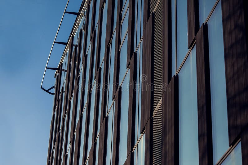 Mirrored Facade Building. Modern Office Against Blue Sky Stock Photo ...