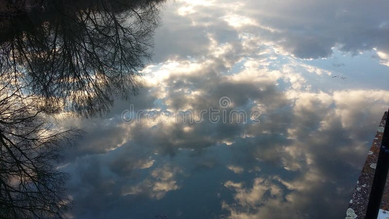 Mirrored Sky and Clouds in the Lake Stock Image - Image of mirrored ...