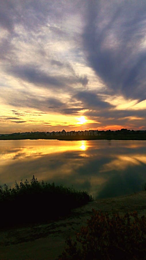 Mirrored sunset stock photo. Image of city, away, calm - 84245412