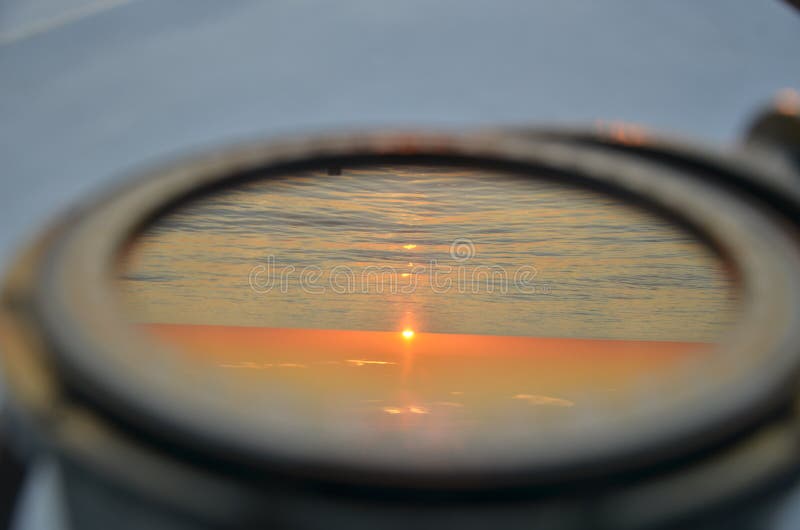 Mirrored sunset in compass stock photo. Image of compass - 84882852