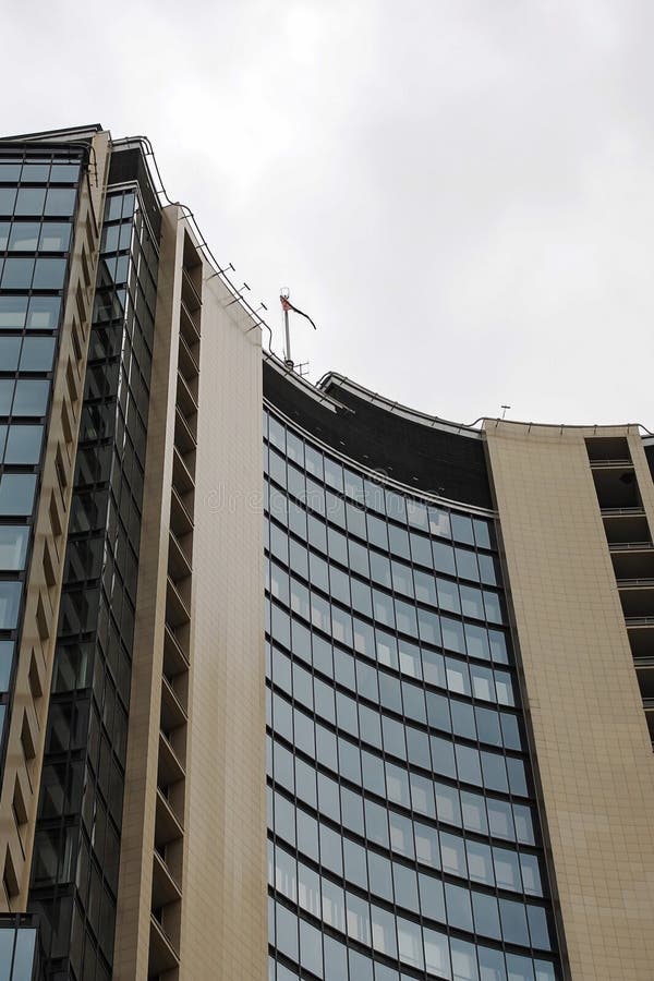 Mirrored Windows on a Tall Modern Building Stock Image - Image of ...