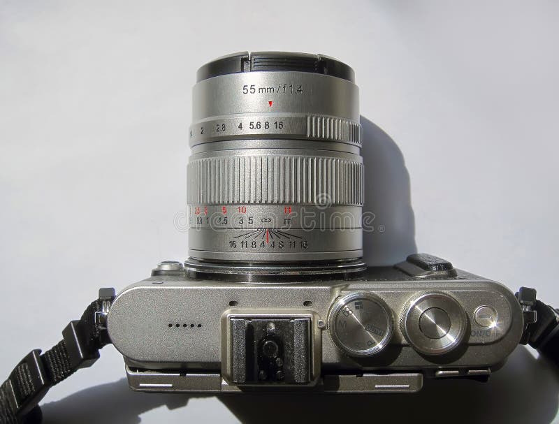 A Mirrorless Camera with Interchangeable-lens Large Aperture Lens Stock ...