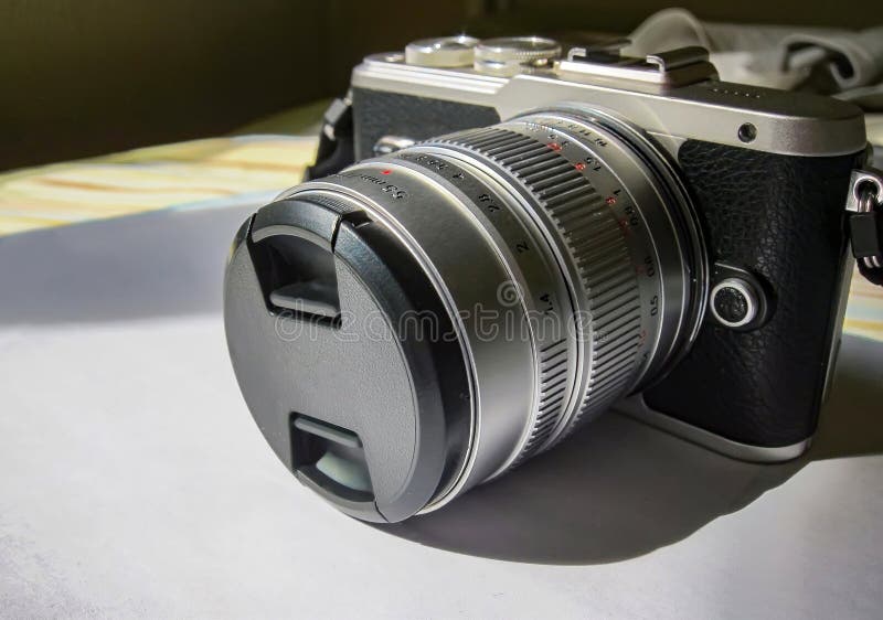 A Mirrorless Camera with Interchangeable-lens Large Aperture Lens Stock ...