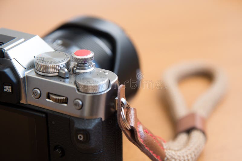Mirrorless Digital Camera with Control Buttons , Lens and Strap Stock ...
