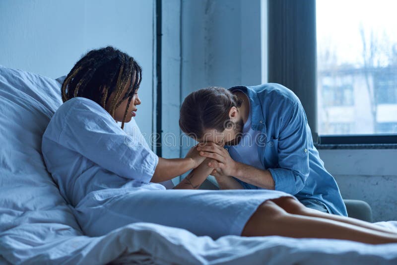 Miscarriage Depressed African American Woman Holding Stock Image