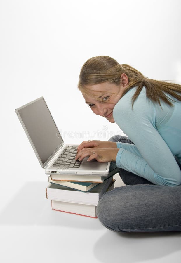 Mischievous girl on laptop stock photo. Image of learn - 1938982