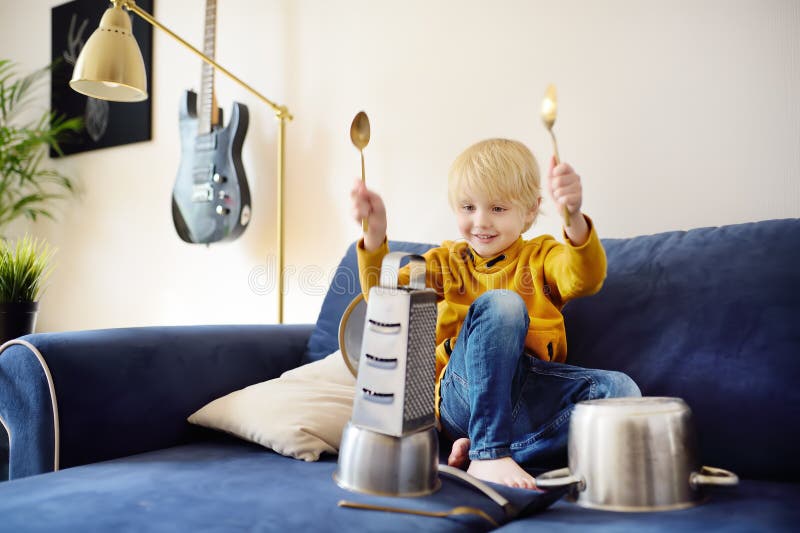 Mischievous Preschooler Boy Play the Music Using Kitchen Tools and ...