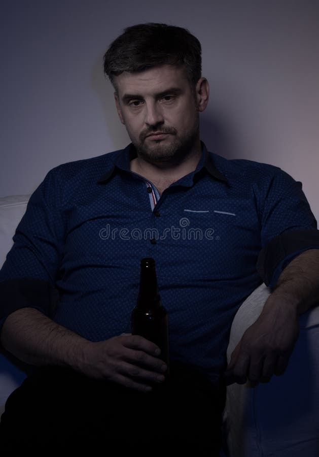 Miserable Man Drinking Beer Stock Photo - Image of sitting, melancholy ...