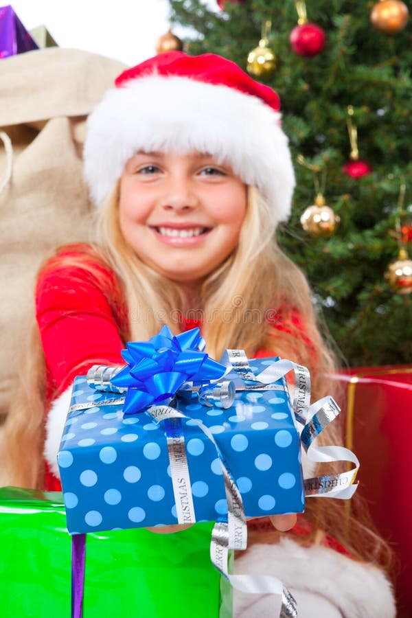 Miss Santa Holding a Gift and Smiling Stock Photo - Image of cute ...