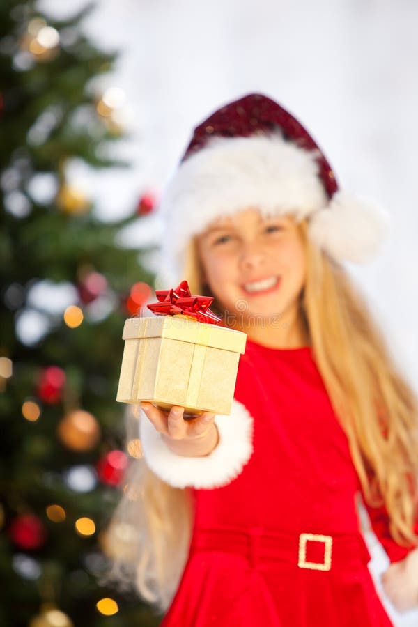 Miss santa holding gifts stock photo. Image of happy - 16778904