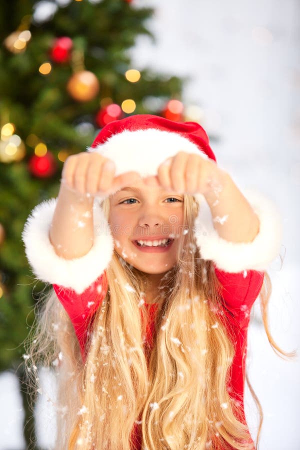 Miss santa with snow stock photo. Image of flurry, smiling - 16394816