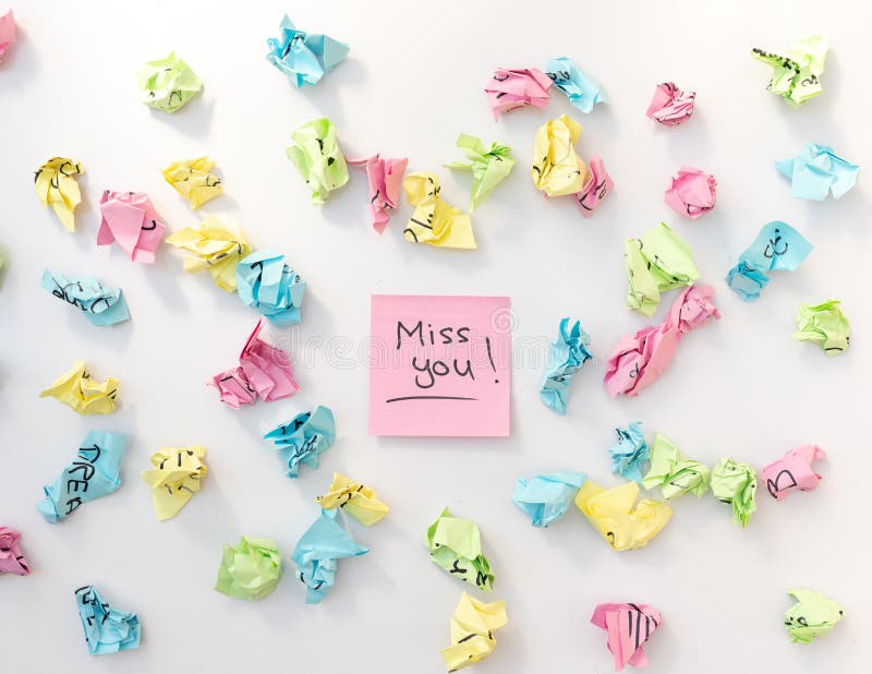Miss You Note Handwritten on a Pink Sticky Note with a Decorated ...