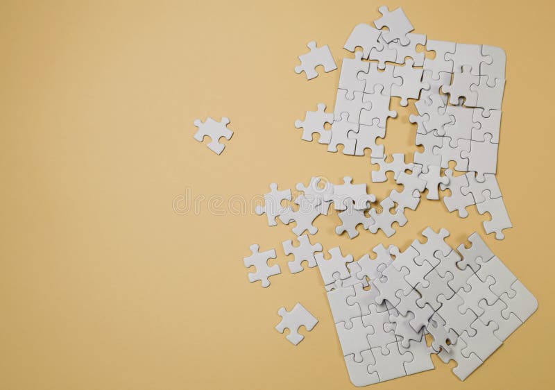 Fragment of a Folded White Jigsaw Puzzle and a Pile of Uncombed Puzzle ...