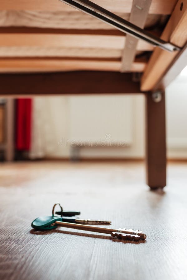 Missing keys under the bed stock image. Image of hide - 60140421