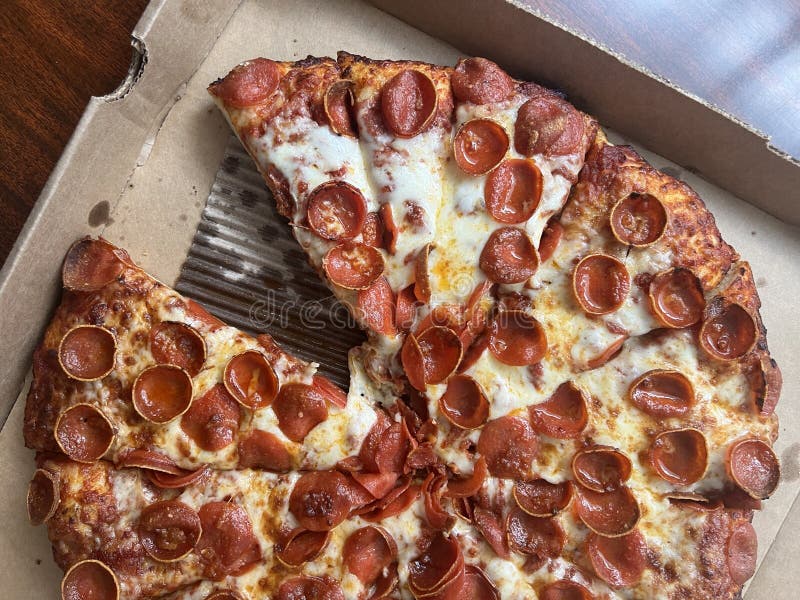 Missing Slice of Pizza from a Large Pepperoni Pizza in a Cardboard Box ...