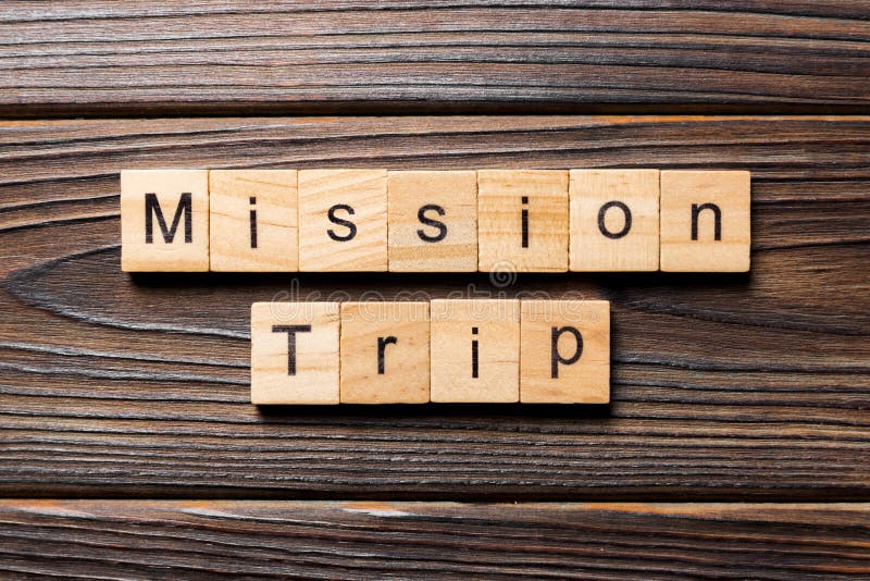 Our Mission on Word Written on Wood Block. Our Mission Text on Table ...