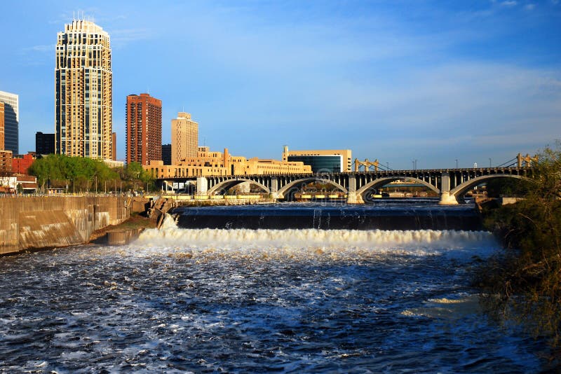Minneapolis, MN, River And Bridge Near Downtown Buildings Stock Photo ...