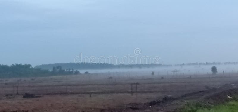 Mist brown land stock photo. Image of wind, dawn, tower - 195787926