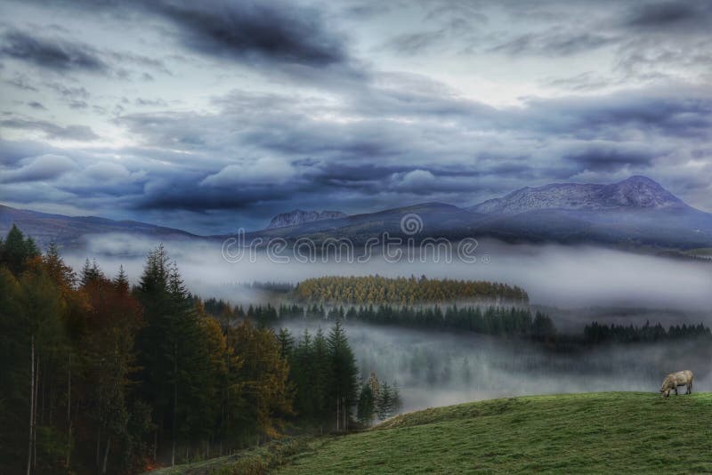 Mist Covered Valley and Mountains Stock Photo - Image of morning, mist ...