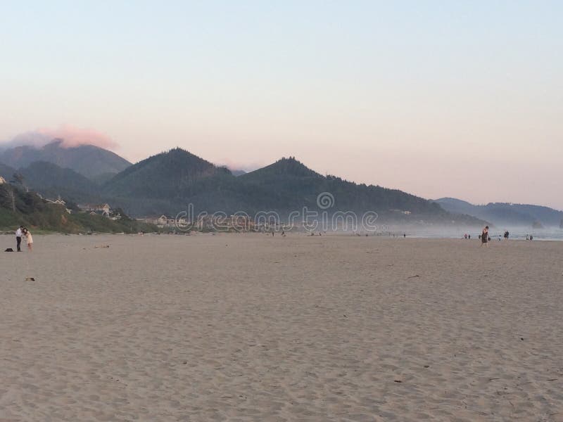 Misty beach stock image. Image of oregon, mist, mountains - 99915367
