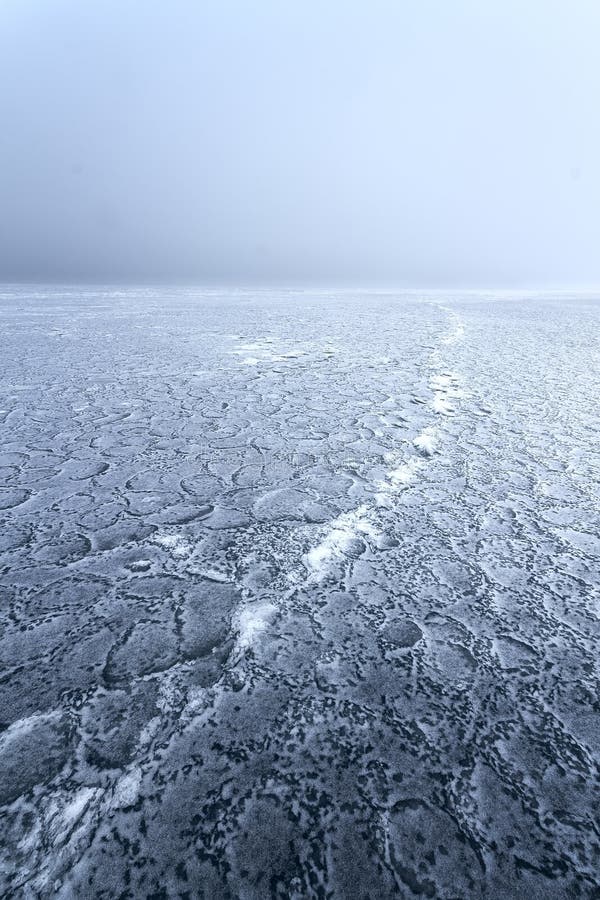 Mist on a frozen lake stock image. Image of horizon - 100274847
