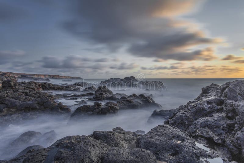 Mist over the rocks stock photo. Image of clouds, waves - 50215572
