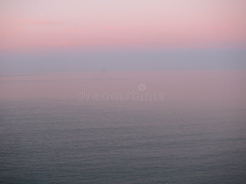 Mist on the sea at sunset stock image. Image of smoky - 161845965