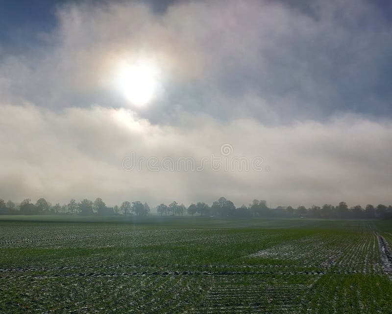 Misty Field with Sunlight in Central Germany Stock Image - Image of ...