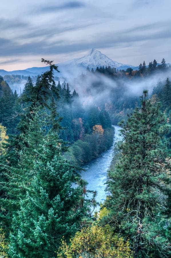 Misty Fog Envelops Mountains Near River and Range Stock Photo - Image ...