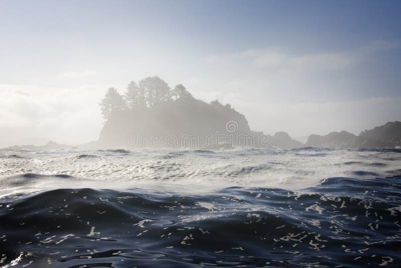 Misty island on the ocean stock image. Image of mist - 13094801