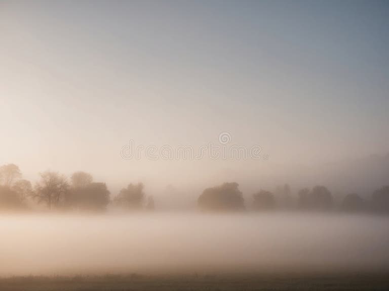 Misty Morning Landscape with Soft Sunlight. Stock Image - Image of ...