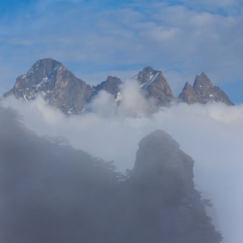 Misty Mountain Ridge in Snow Stock Image - Image of mist, mountain ...