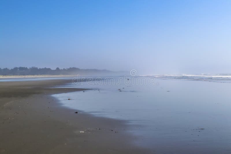 Misty Ocean and Beach with Breakers on Horizon - Water and Distant ...