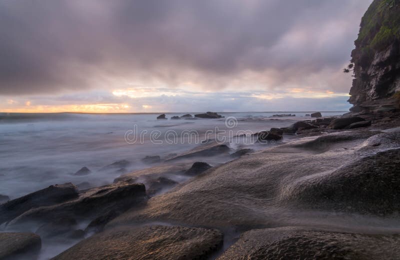 Misty rocks after rain stock image. Image of beach, surf - 55596799