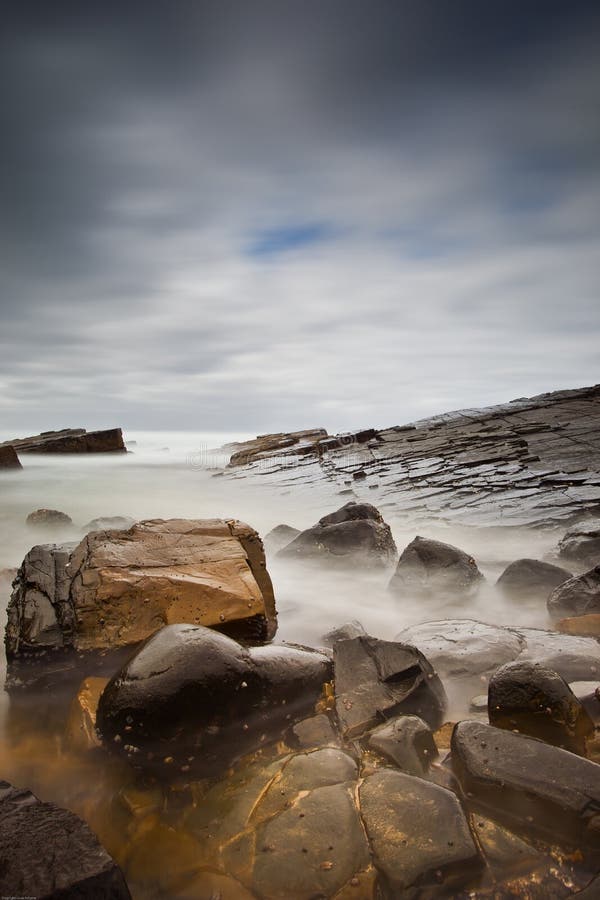 Misty sea and rocks stock image. Image of milky, romantic - 23639951