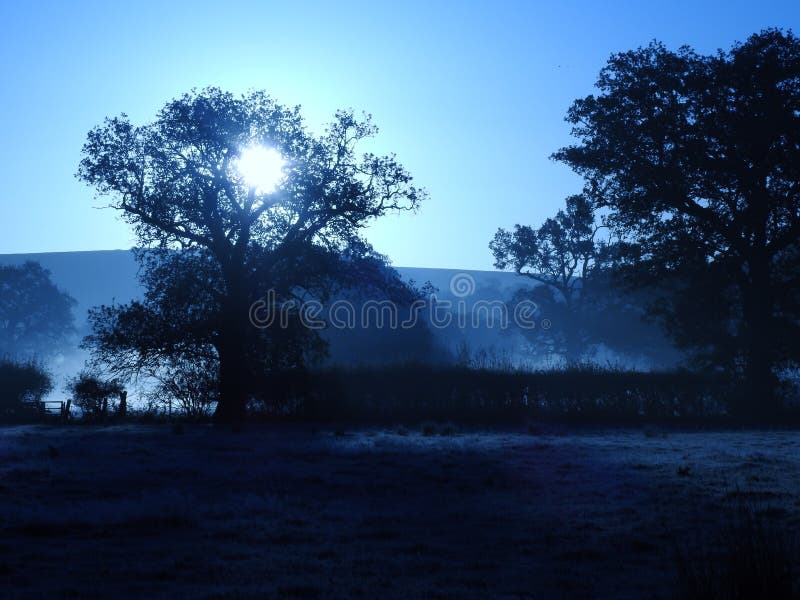 A Misty Sunrise Autumn in Swindon Park Stock Image - Image of sunny ...