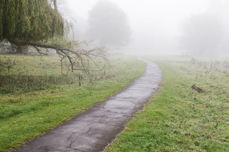 Misty Trail Leads Along the Mountain Ridge. Path and Steep Slopes ...