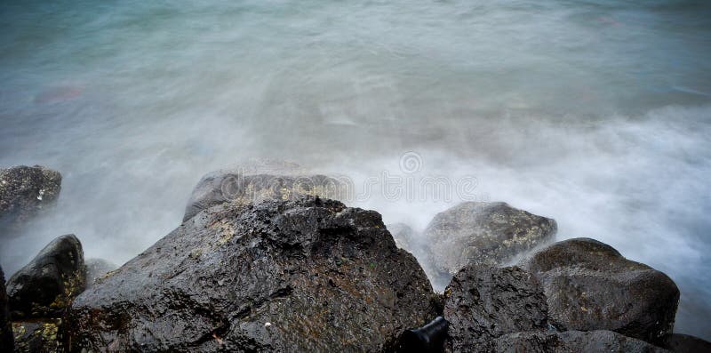Misty Wave Hits Rocky Shore Stock Photo - Image of misty, awesome: 22561038
