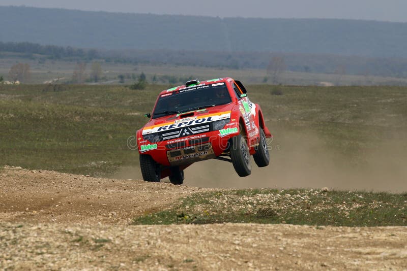 Rally car jumping editorial stock photo. Image of navigator - 4883018