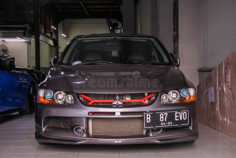Mitsubishi Lancer Evolution IX MR Inside a Garage Front View Editorial ...