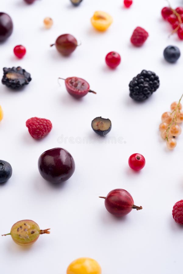Mix of Berries Isolated Over White Background Table. Stock Photo ...
