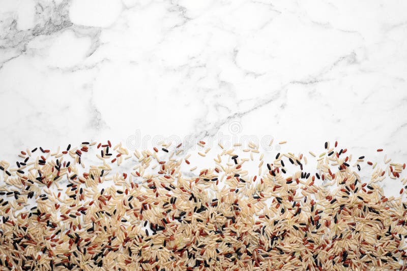 Mix of Brown Rice on Marble Table. Space for Text Stock Image - Image ...