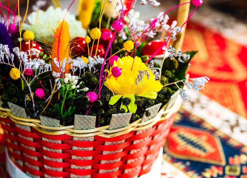 Mix of Colorful Spring Flowers in a Braided Wicker Basket Stock Photo ...