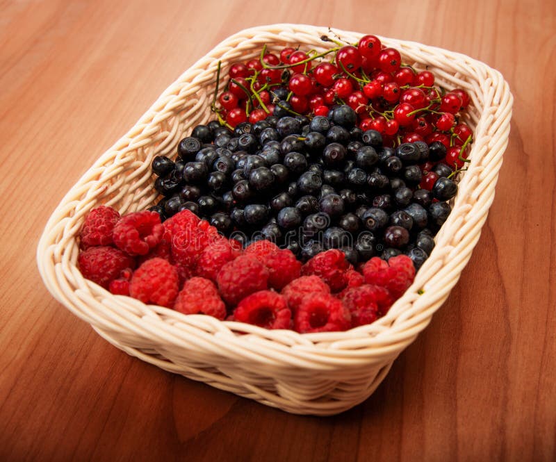 Different Berries in Basket Stock Photo - Image of basket, organic ...