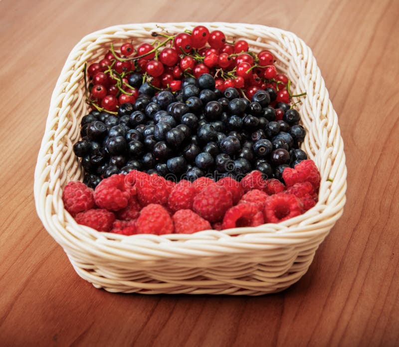 Different Berries in Basket Stock Photo - Image of blueberry ...
