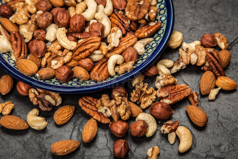 Mix of Different Nuts Closeup Photo Stock Photo - Image of table ...