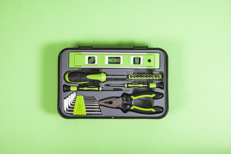 Mix of Different Tools in One Box on Green Background Stock Image ...