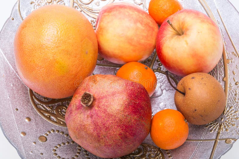 Mix fresh fruits on plate stock photo. Image of apple - 78053458