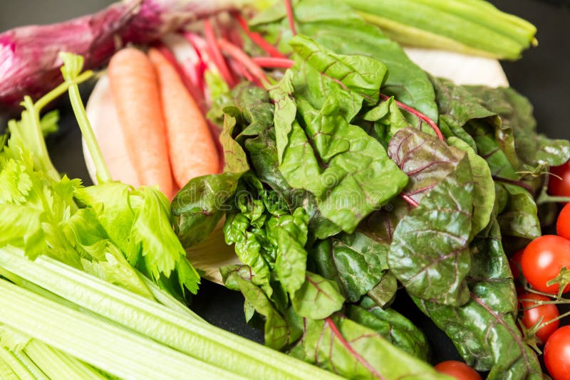 A Mix of Fresh Vegetables on an Old Table Ready To Be Cooked To Stock ...