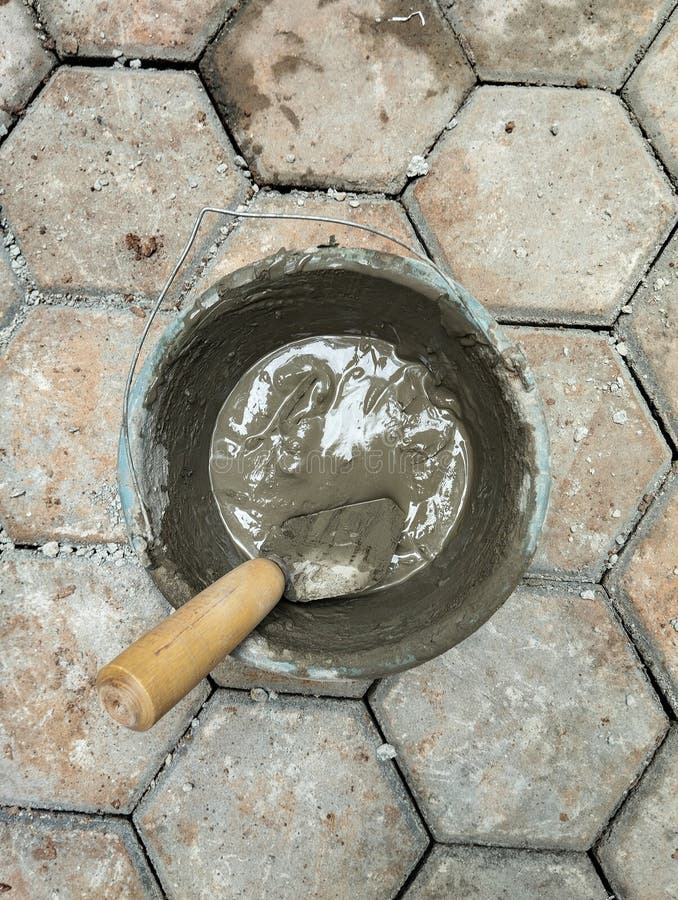 Mix the Gray Cement in the Blue Bucket until There are No More Cement ...